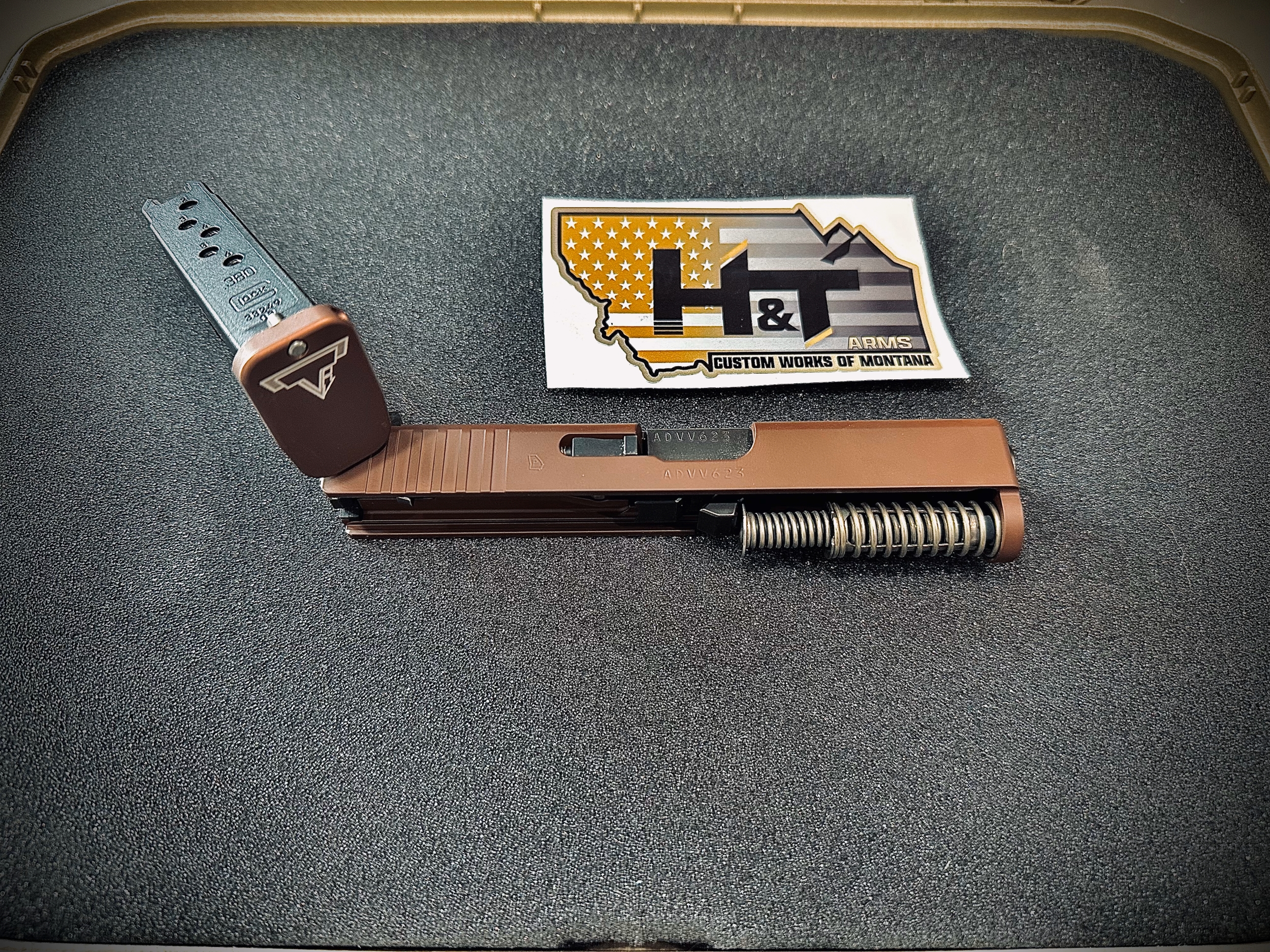 Glock Slide finished with a Barrett® Brown and USMC Red Finish | Cerakote