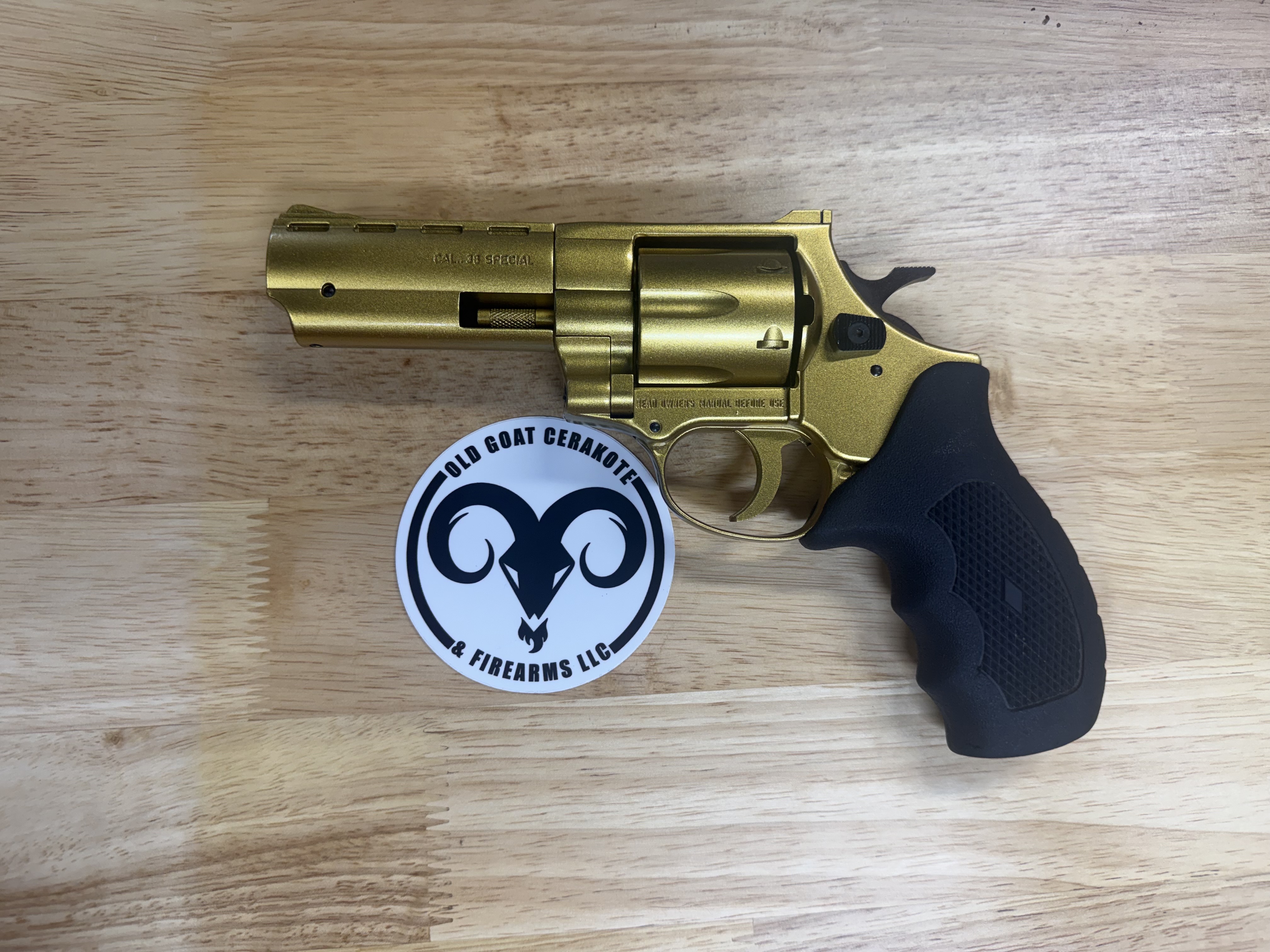 Gold Taurus featuring a Cerakote Fx Gold and Graphite Black Finish ...