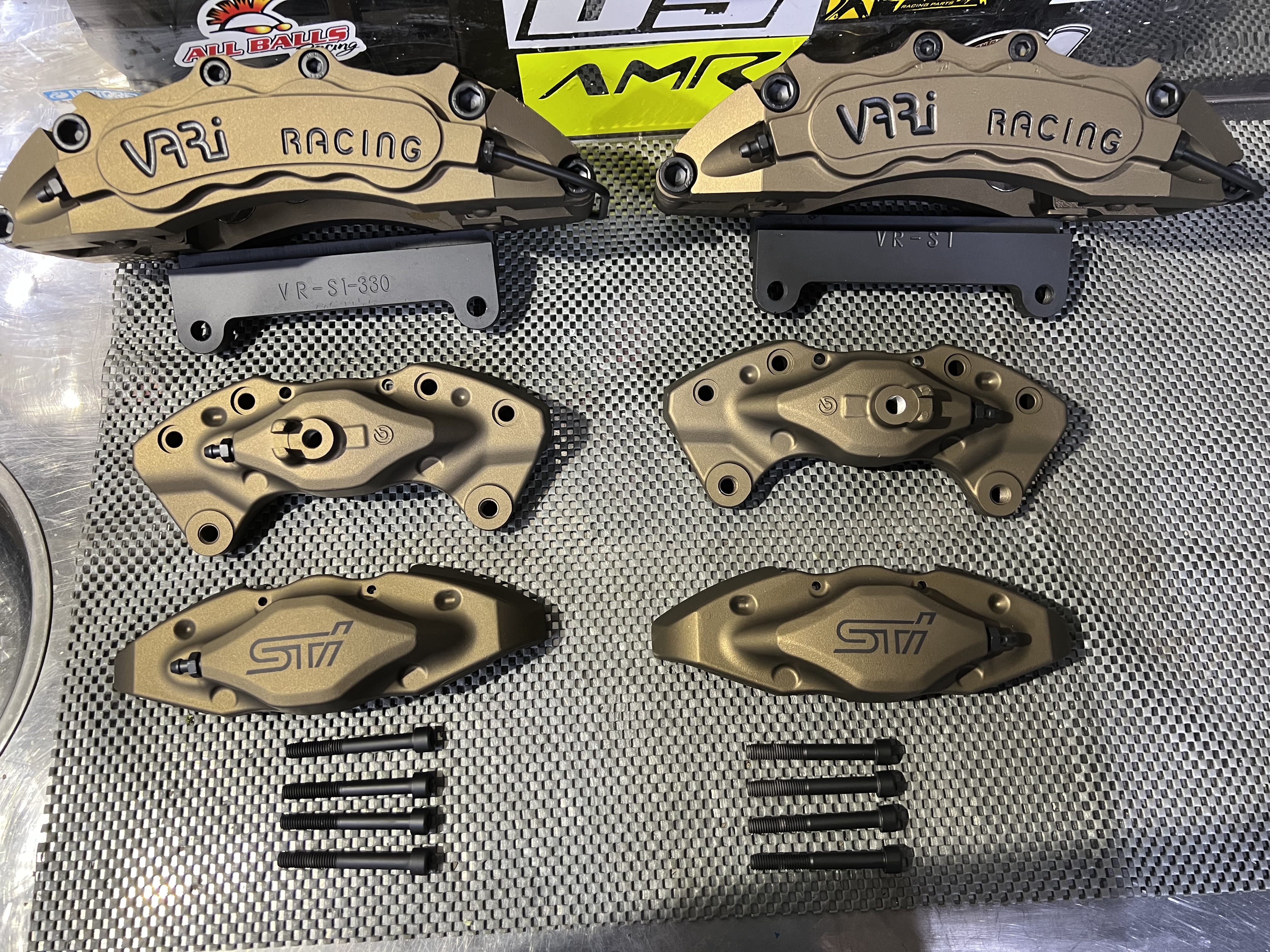 Subaru Brake calipers - burnt bronze with black lettering | Cerakote
