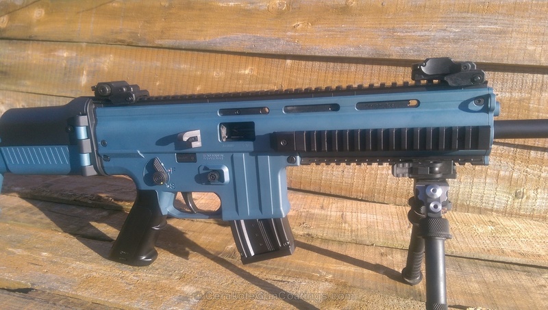 H-185 Blue Titanium with H-146 Graphite Black by Mark Twittey | Cerakote