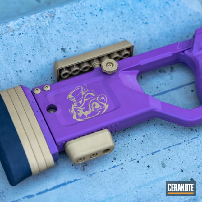 Two Toned Bolt Action Rifle with a Two Toned Purple and Gold Cerakote ...