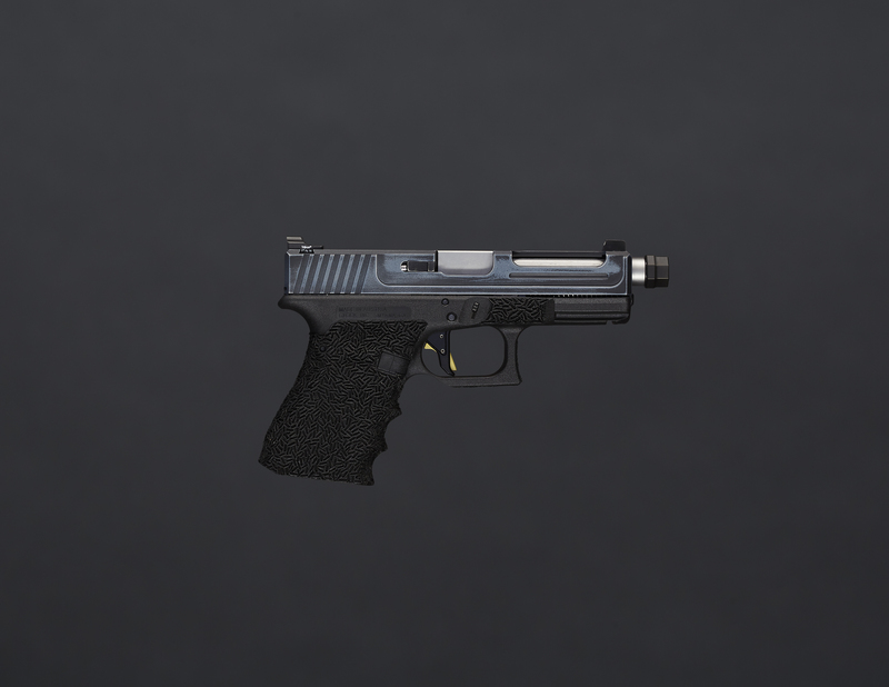 Battleworn custom Glock finished with Armor Black and Blue Titanium ...