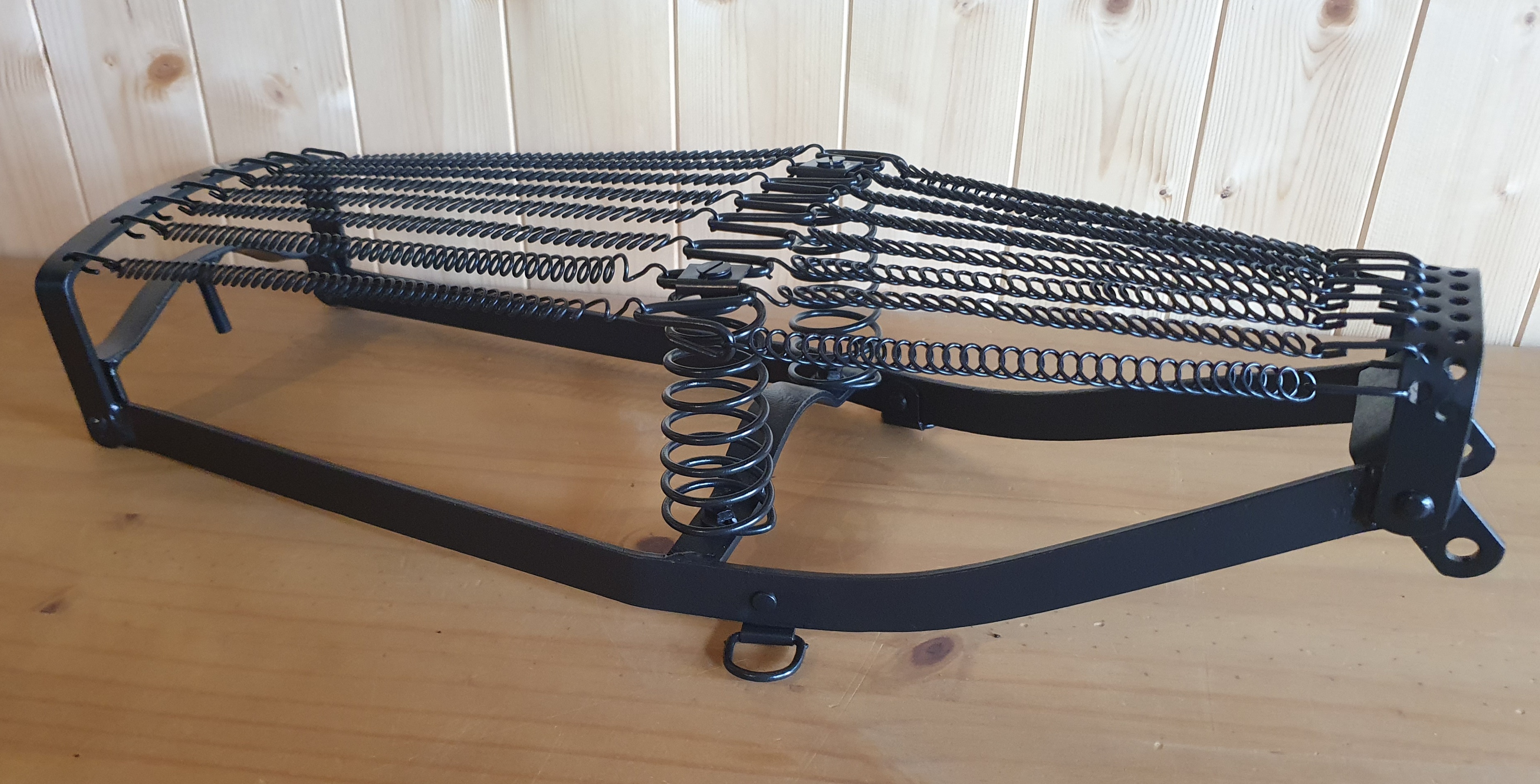 Motorcycle Seat Frame, Cerakoted using BLACKOUT | Cerakote