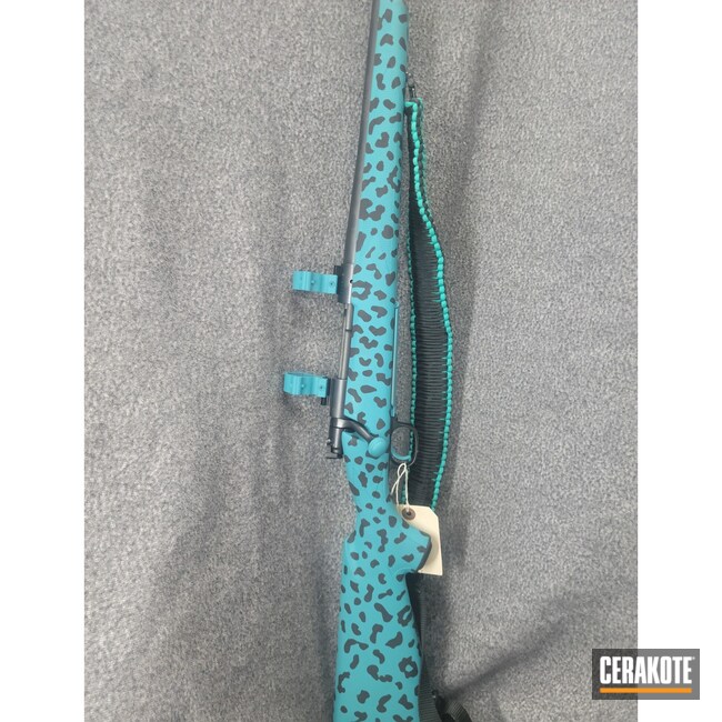 Bolt Action Rifle finished with a Graphite Black and Aztec Teal Finish ...