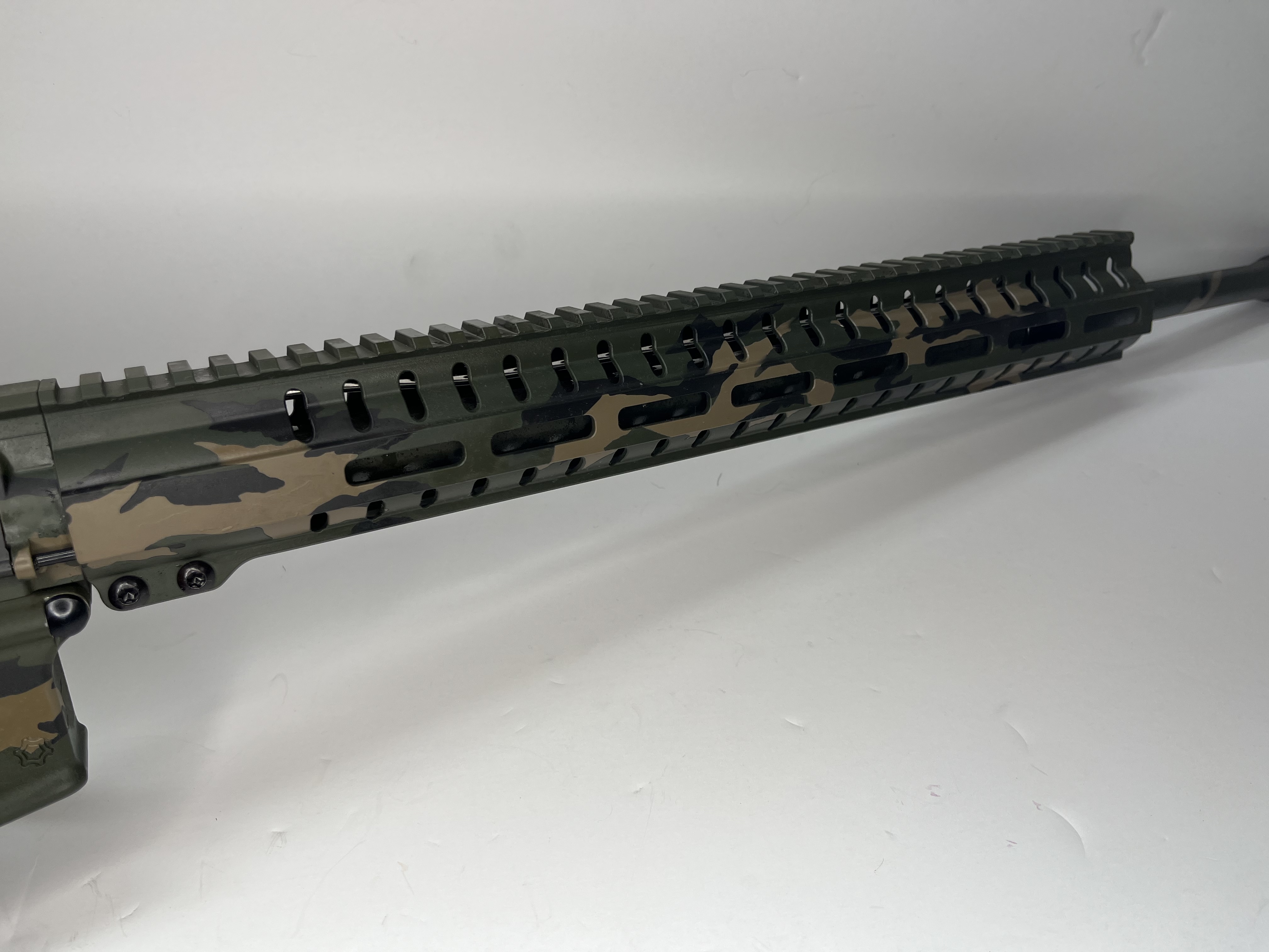 AR Rifle finished in a Mil Spec O.D. Green, Magpul® Flat Dark Earth and ...
