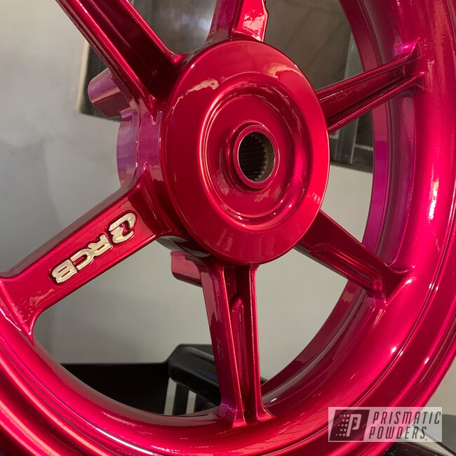 Custom Moto Wheels coated with a Clear Vision and Illusion Pink Finish | Prismatic Powders